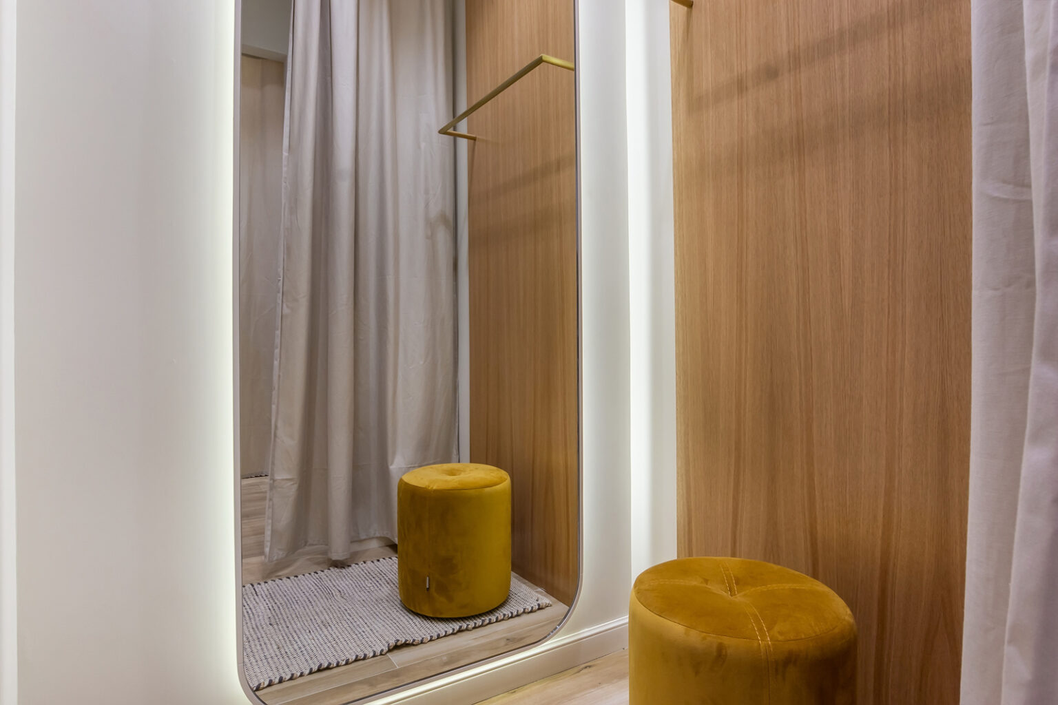 Modern Fitting Room Designs That Enhance Customer Experience - Retail ...